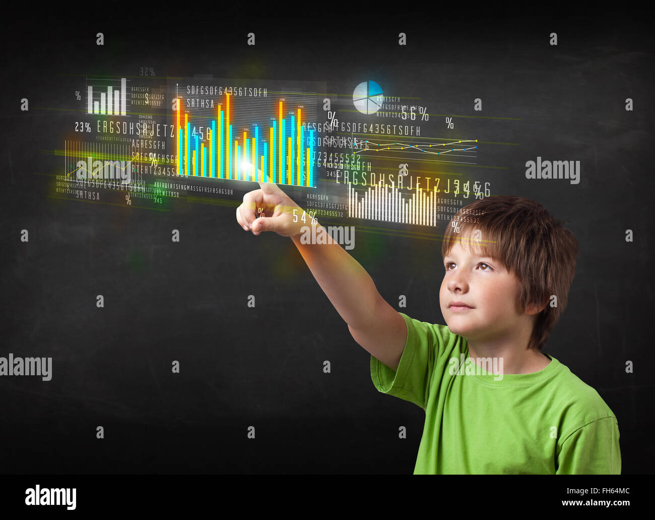 Young boy touching colorful charts and diagrams Stock Photo - Alamy