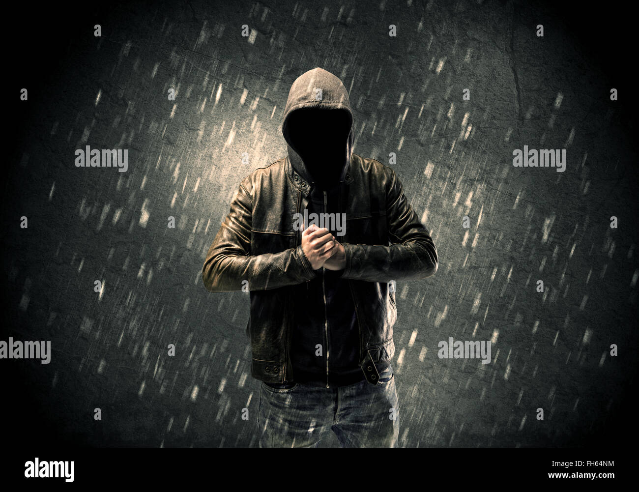Unknown suspect standing in the dark Stock Photo - Alamy