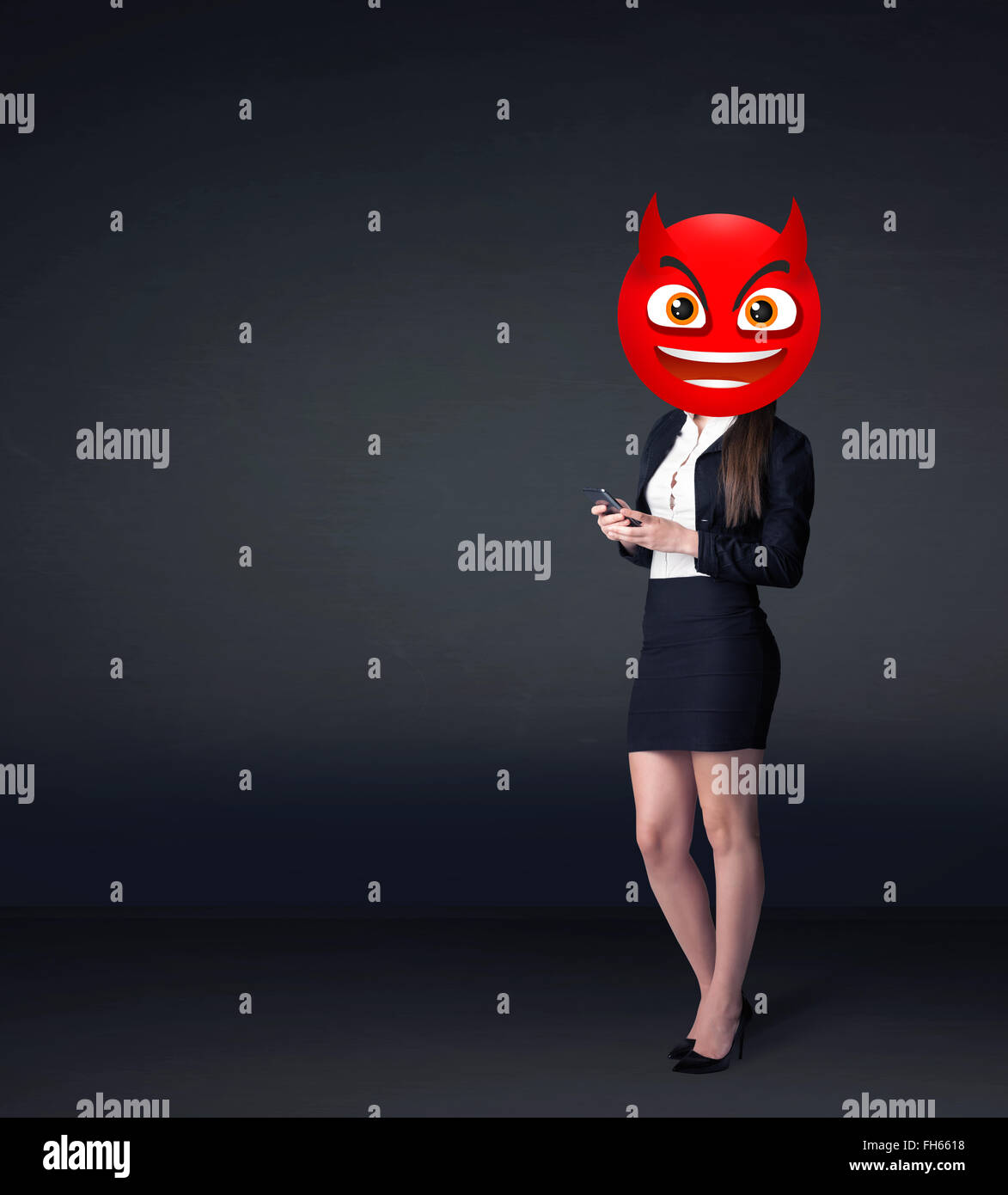businesswoman wears devil smiley face Stock Photo - Alamy