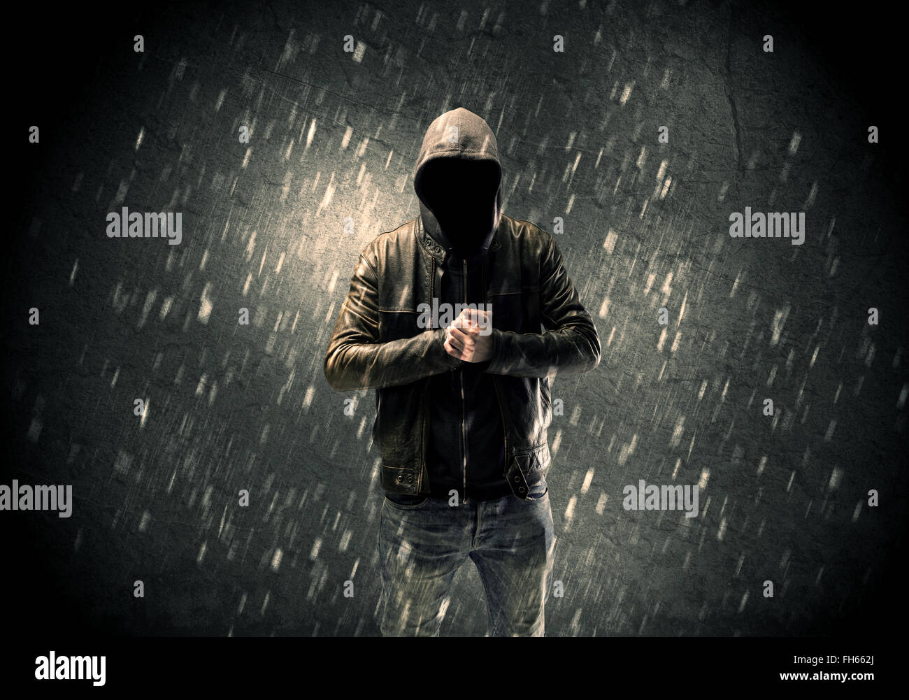 Unknown suspect standing in the dark Stock Photo - Alamy