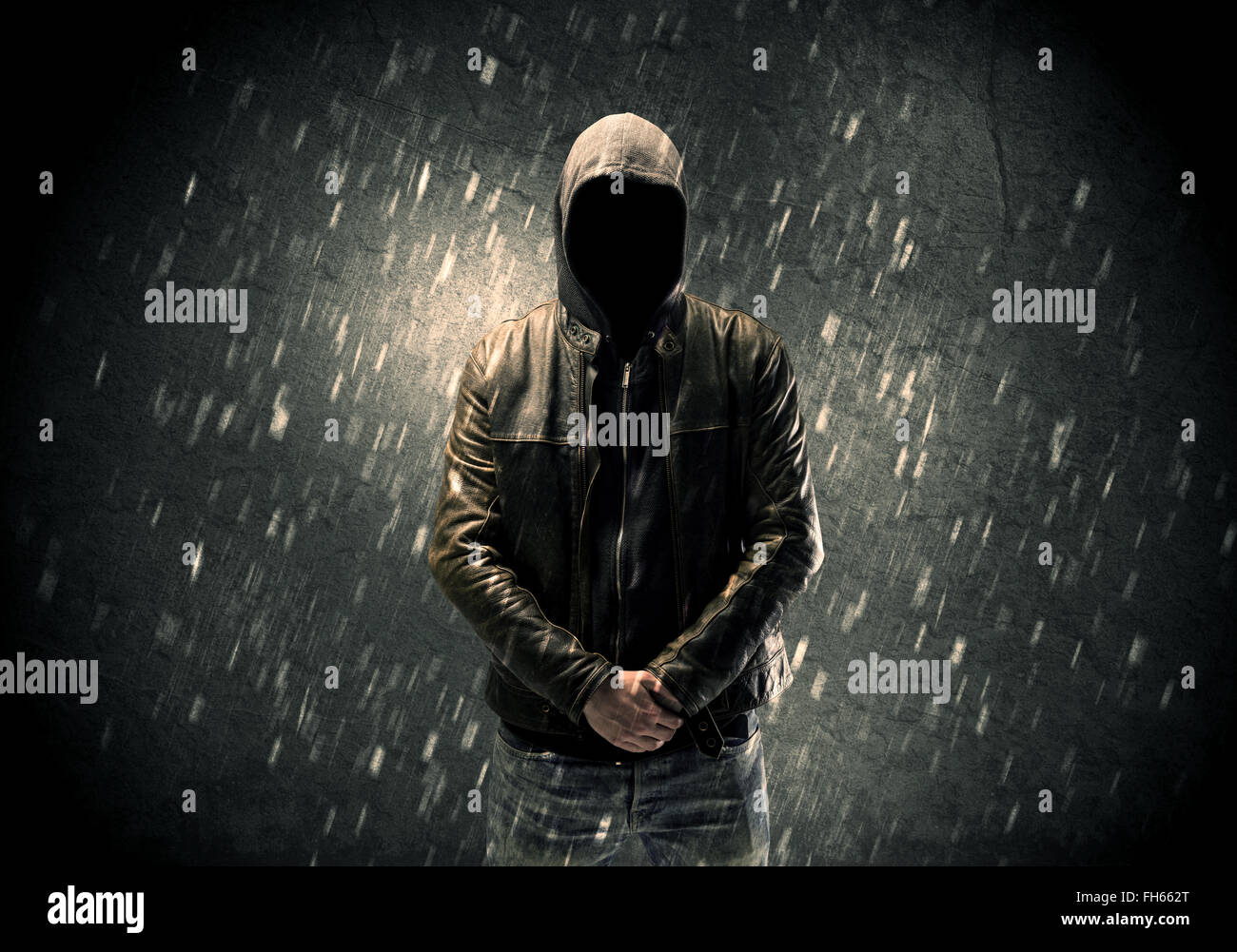 Unknown suspect standing in the dark Stock Photo - Alamy