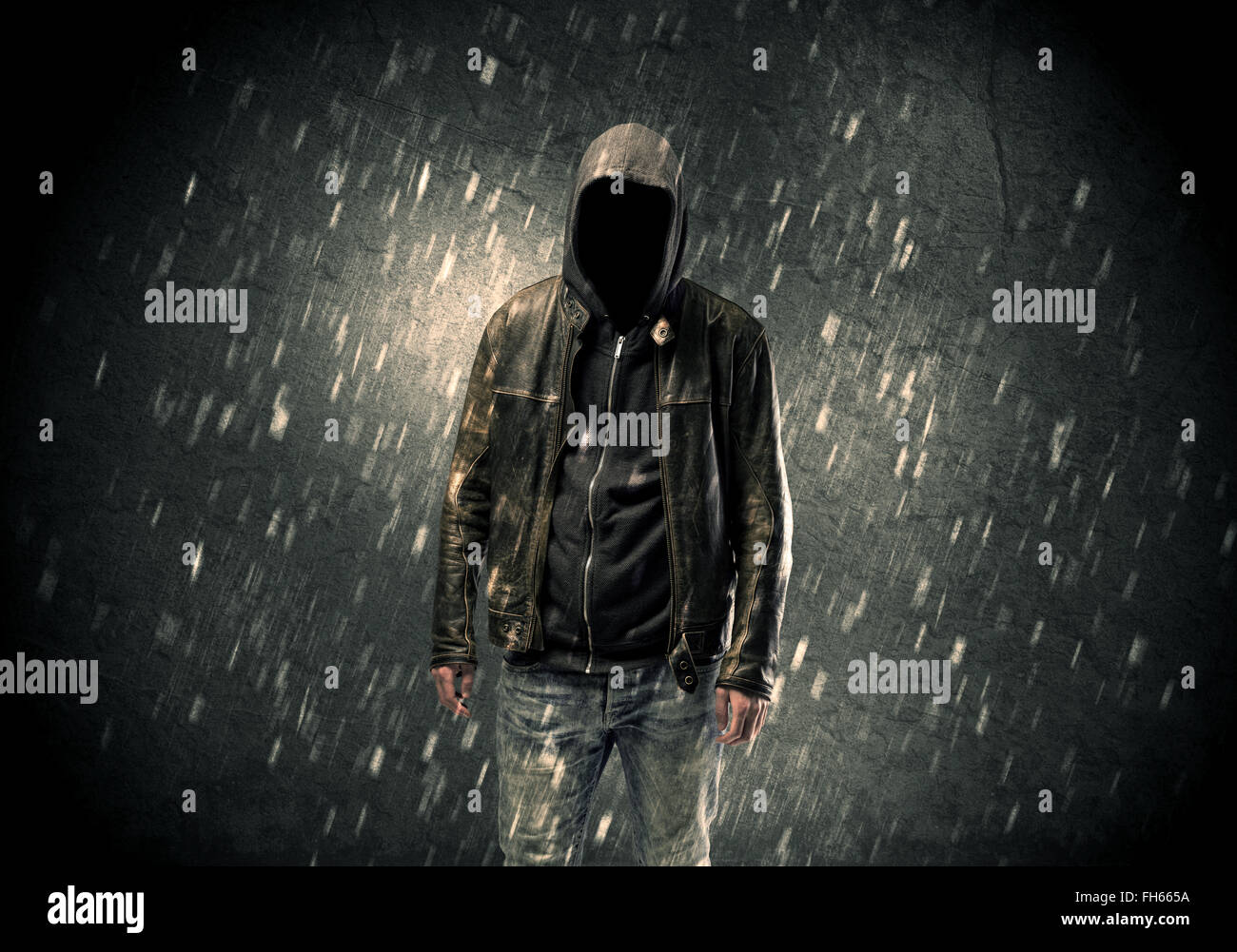 Unknown suspect standing in the dark Stock Photo - Alamy