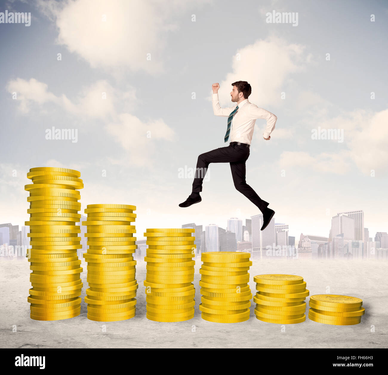 Successful business man jumping up on gold coin money Stock Photo - Alamy