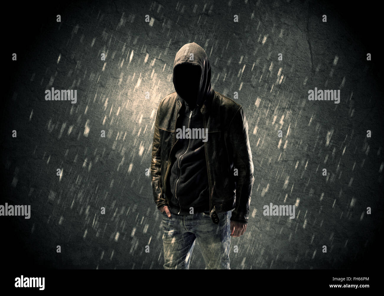 Unknown suspect standing in the dark Stock Photo - Alamy