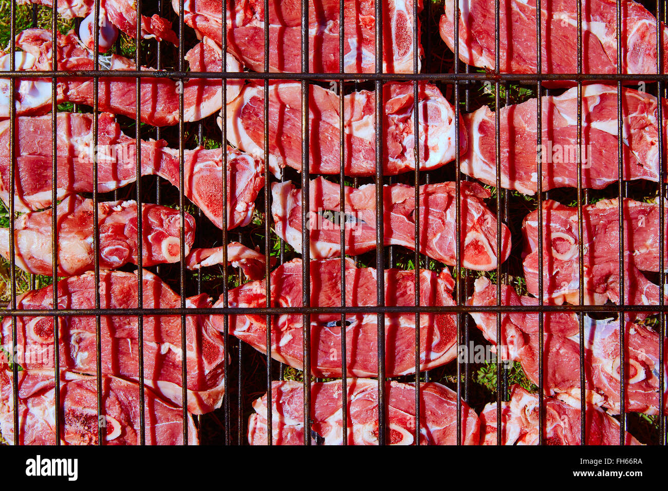Lamb meat grilled at bar b cue from Spain bar-b-cue Stock Photo - Alamy