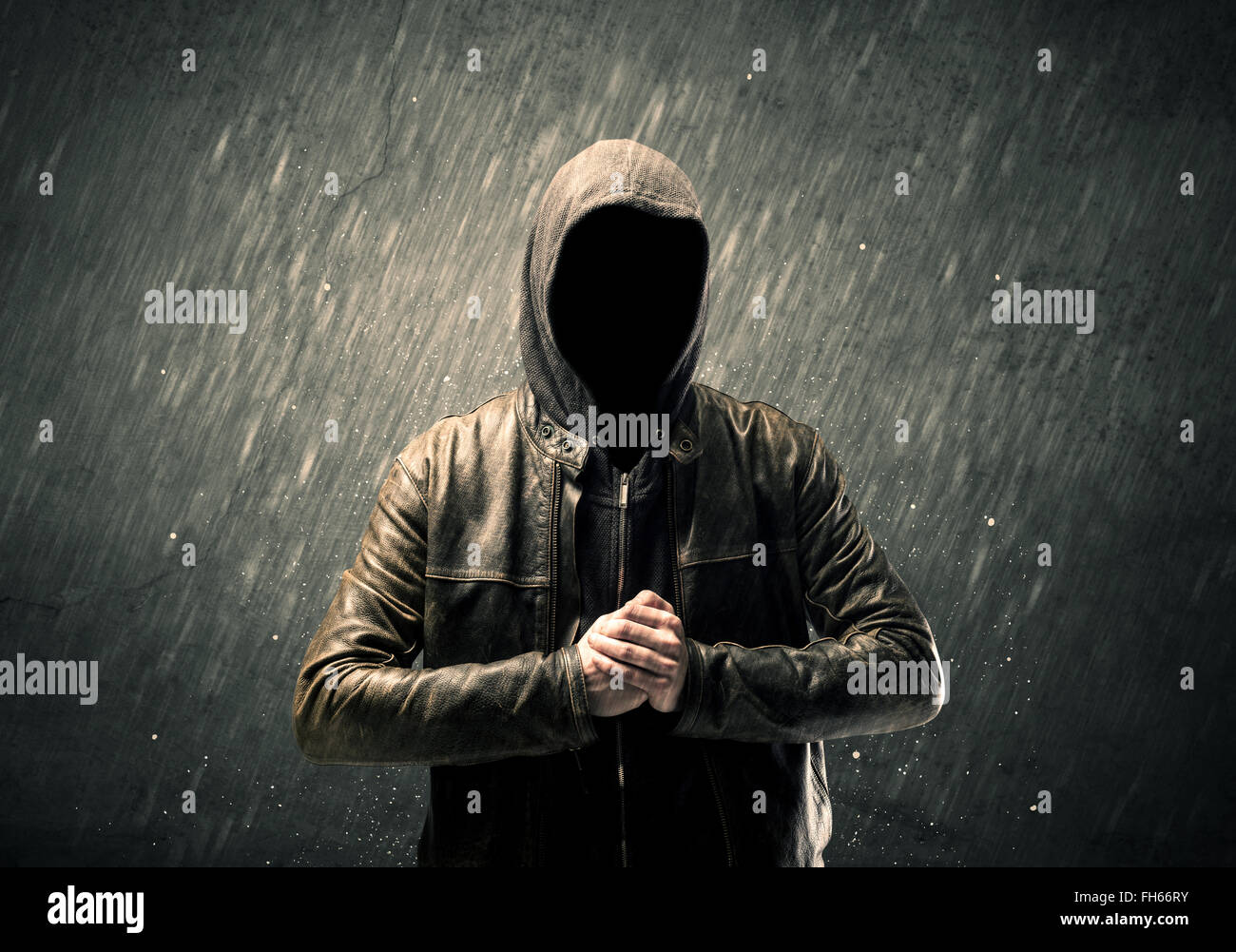 Spooky faceless guy standing in hoodie Stock Photo - Alamy