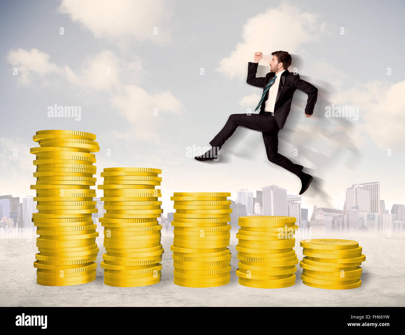 Successful business man jumping up on gold coin money Stock Photo - Alamy