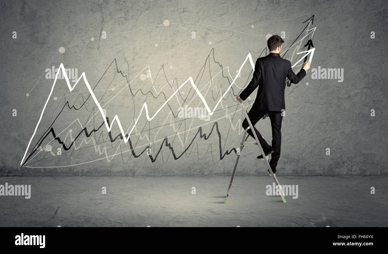 Man on ladder drawing lines Stock Photo - Alamy