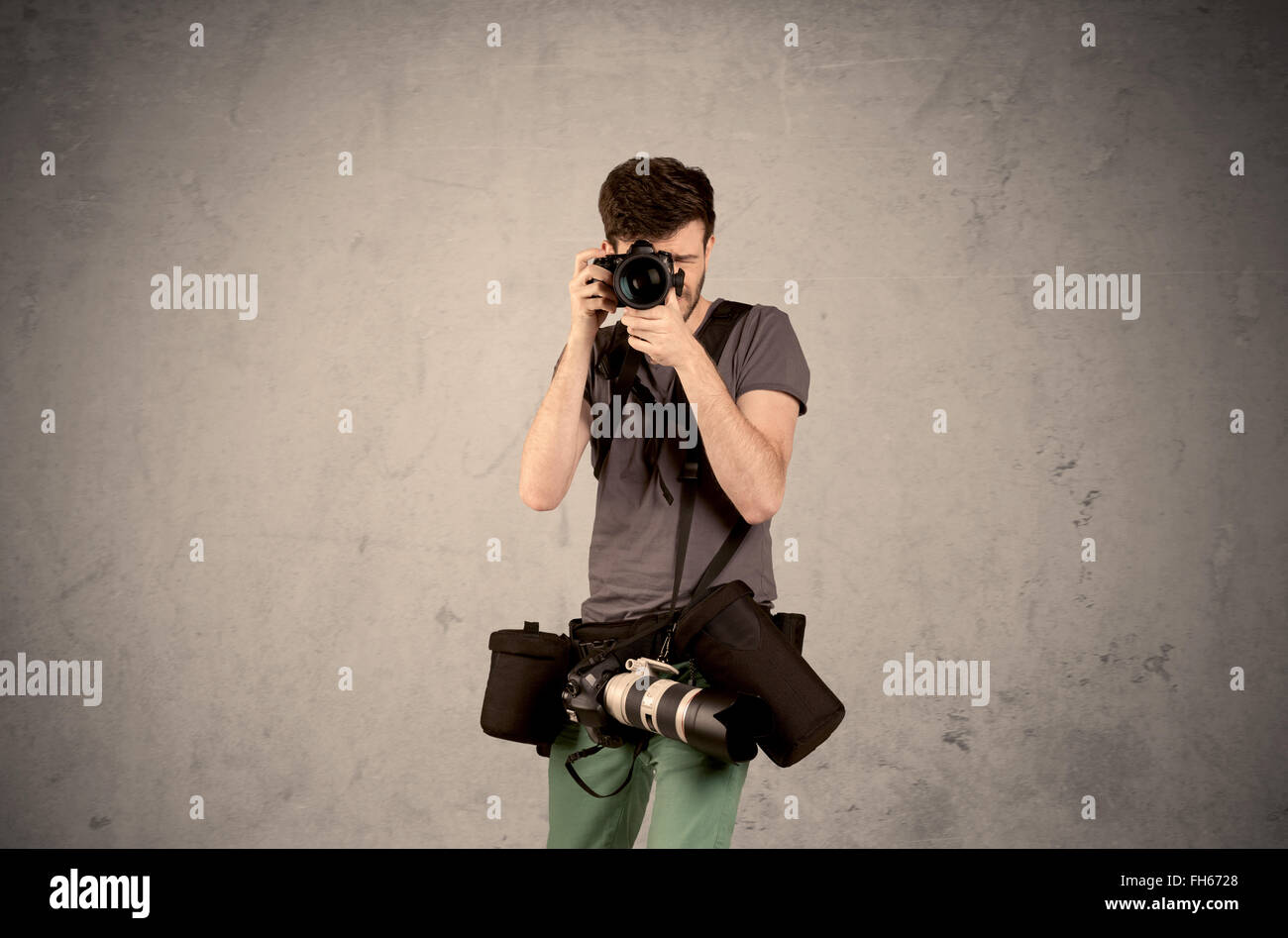 Hobby photographer holding camera Stock Photo - Alamy