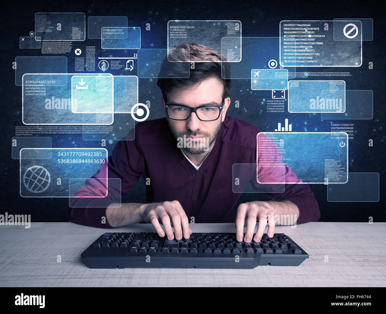 Nerd with glasses hacking websites Stock Photo - Alamy