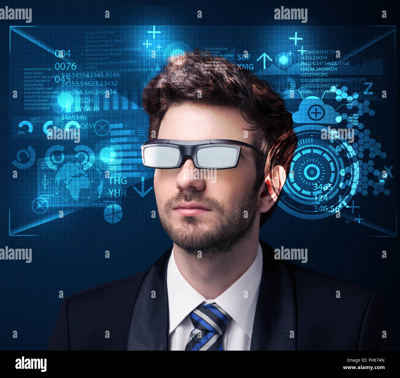 Young man looking with futuristic smart high tech glasses Stock Photo ...