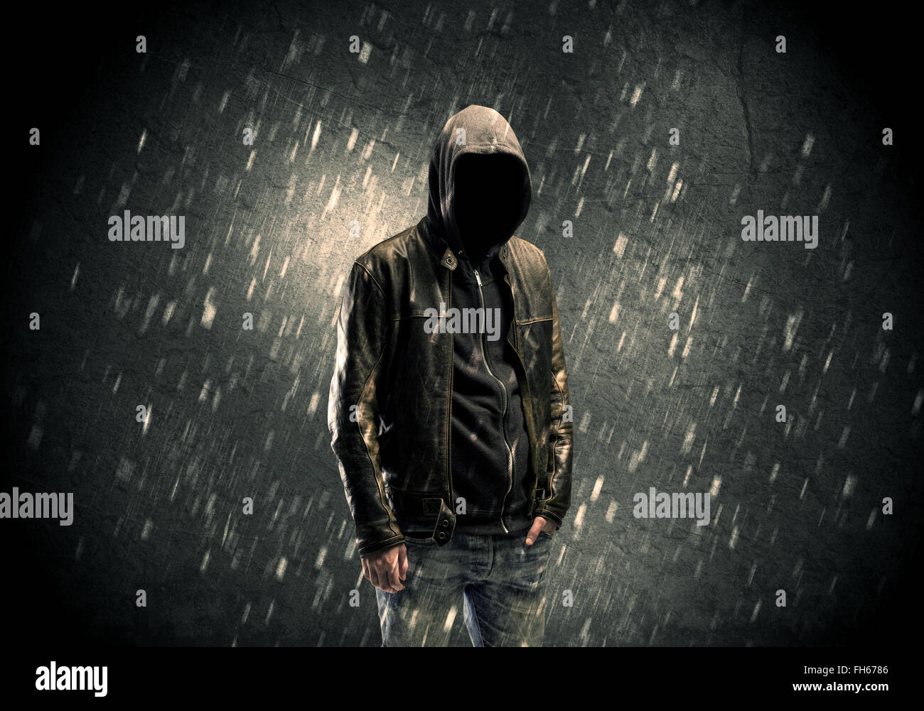 Unknown suspect standing in the dark Stock Photo - Alamy