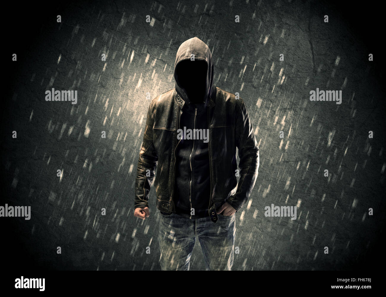 Unknown suspect standing in the dark Stock Photo - Alamy