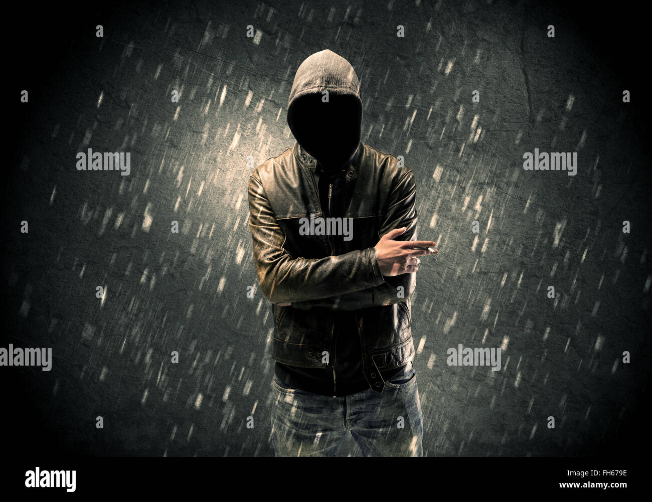 Unknown suspect standing in the dark Stock Photo - Alamy
