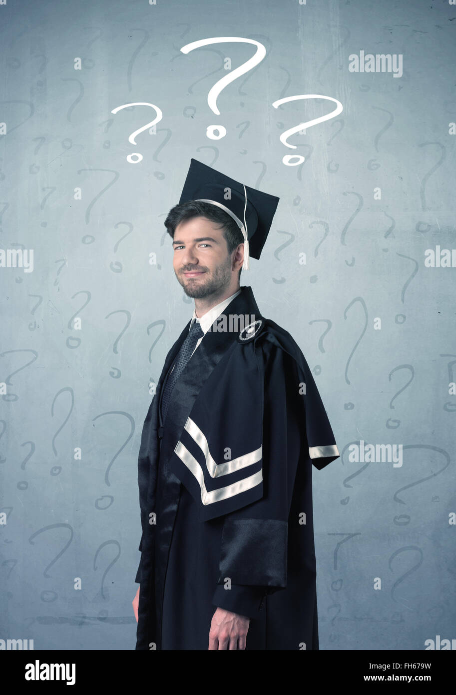 Young graduate teenager with question marks drawn Stock Photo - Alamy