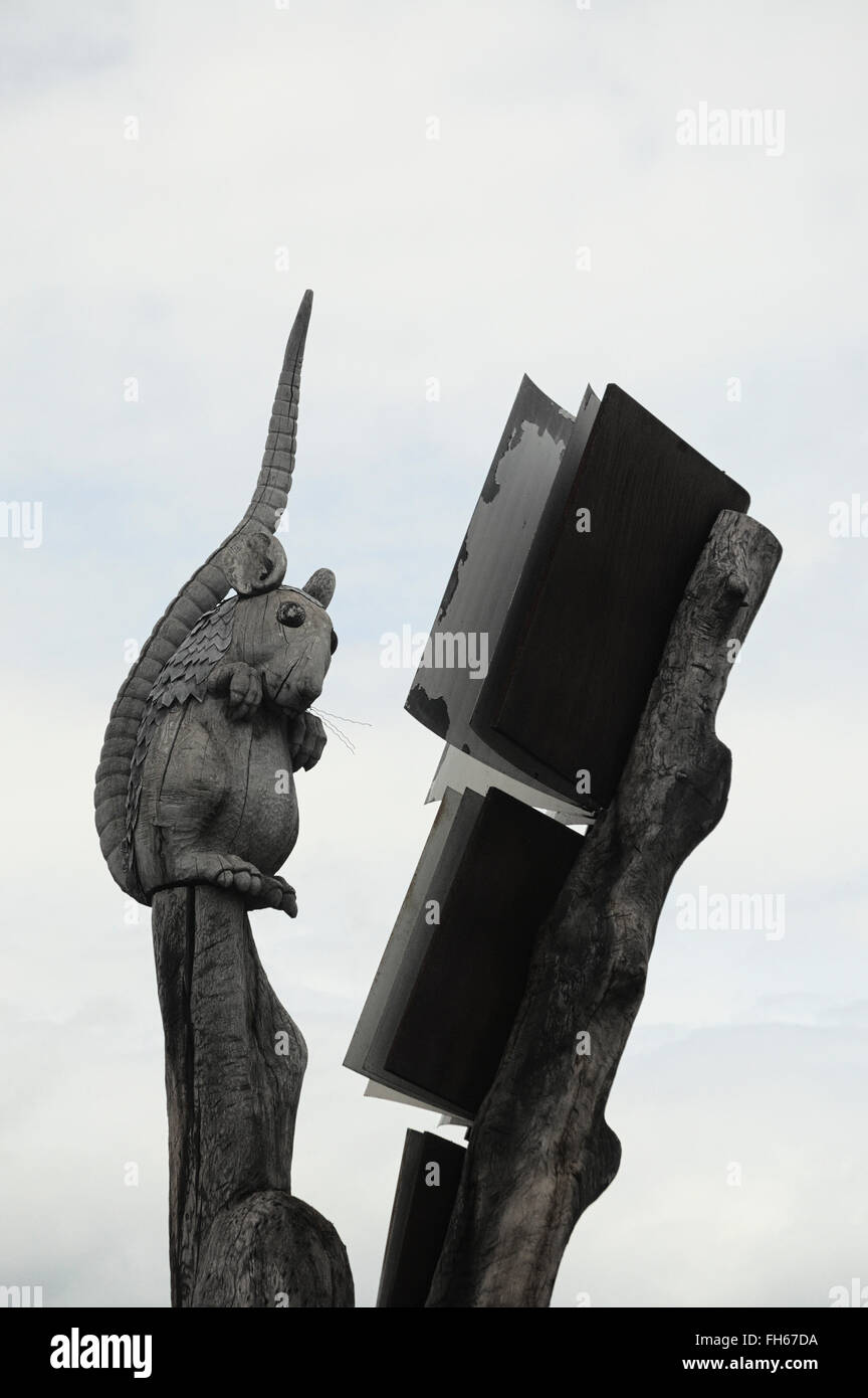 An art sculpture depicting a smart rat reading a book in Austria Stock ...