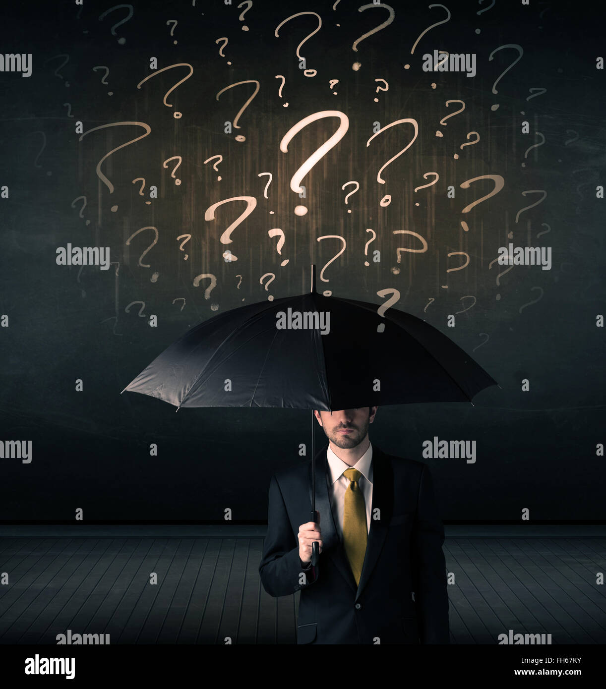 Businessman umbrella question marks hi-res stock photography and images ...