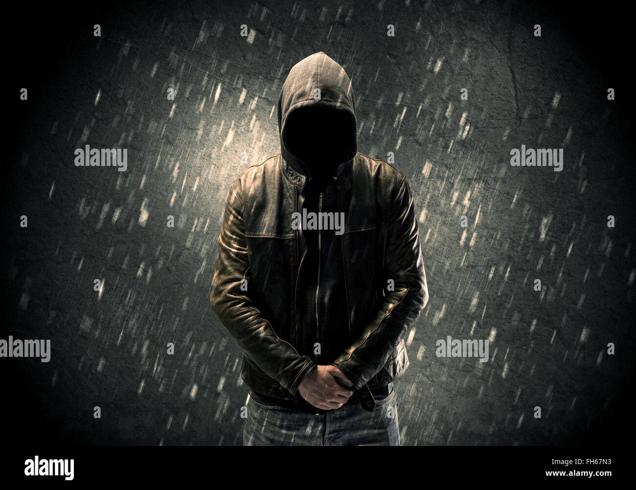 Unknown suspect standing in the dark Stock Photo - Alamy