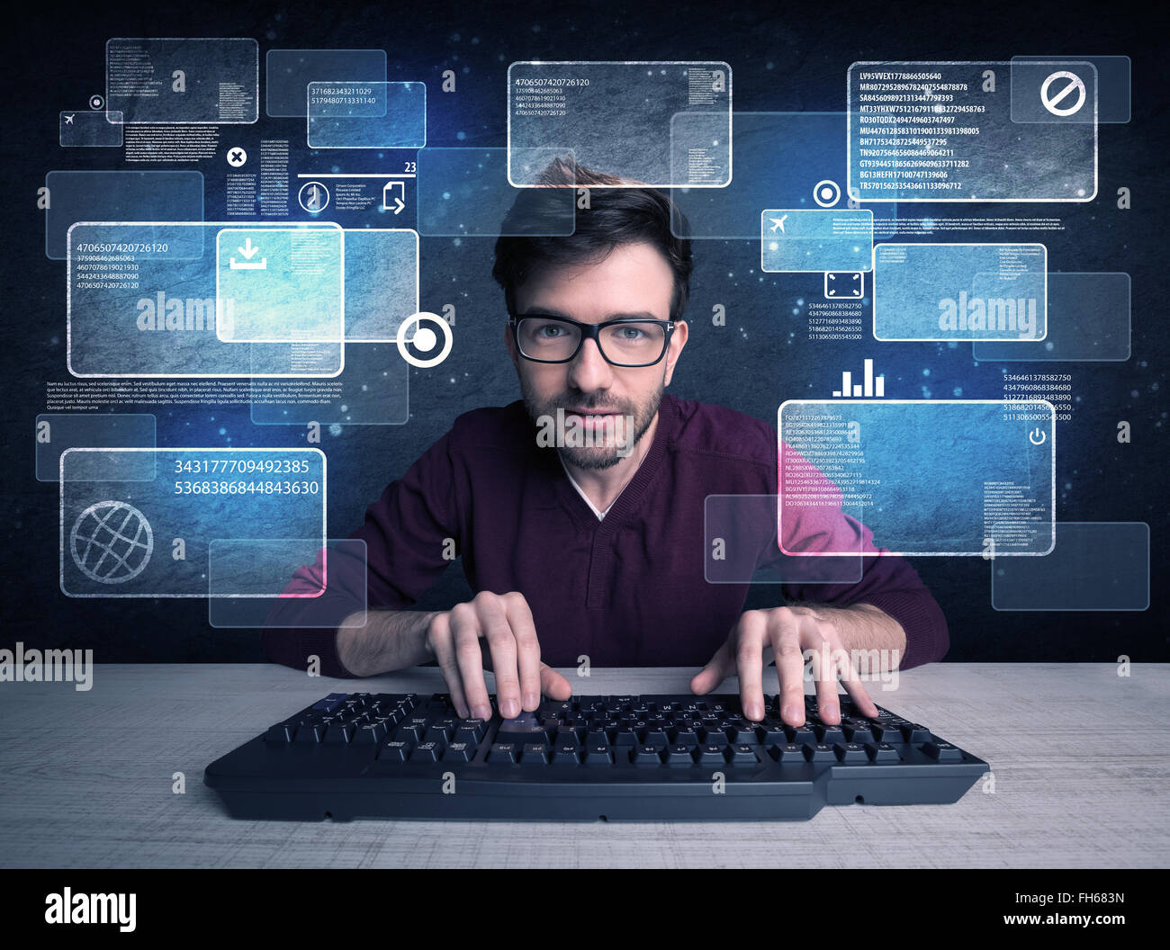 Nerd with glasses hacking websites Stock Photo - Alamy