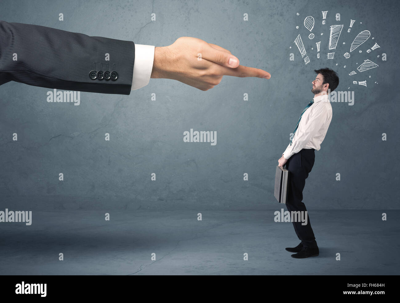 Boss hand firing guilty businessman Stock Photo - Alamy