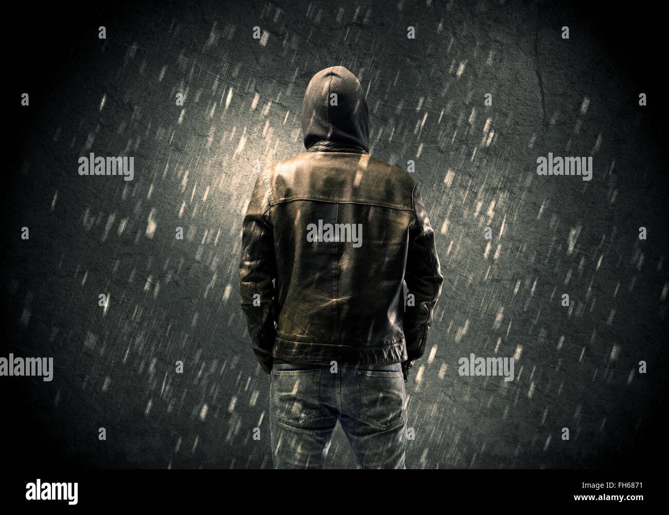 Unknown suspect standing in the dark Stock Photo - Alamy