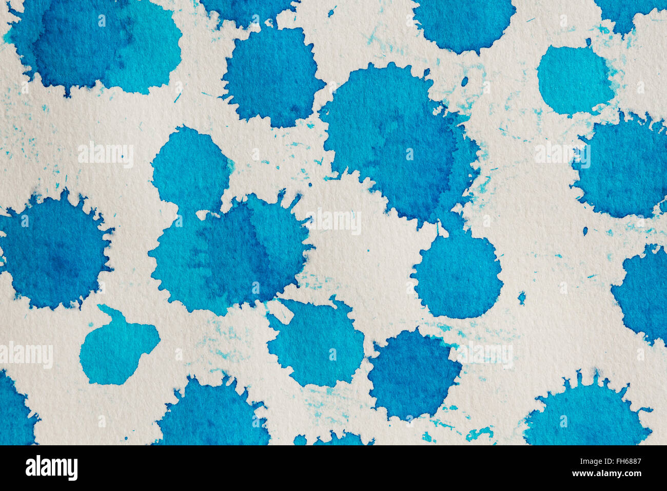 Watercolor blue abstract with ink blots on white grainy paper. To use ...