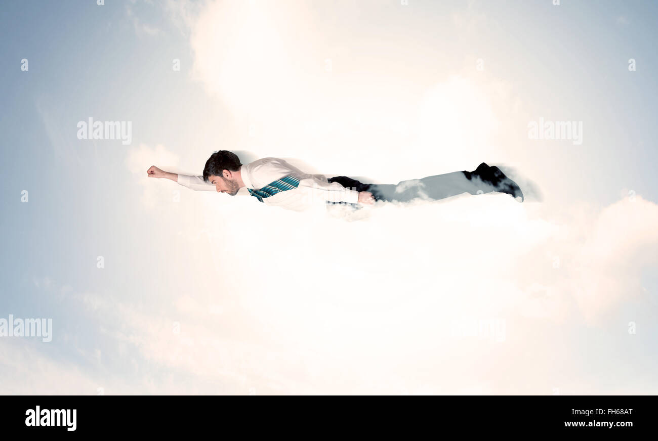 Business man flying like a superhero in clouds on the sky Stock Photo ...