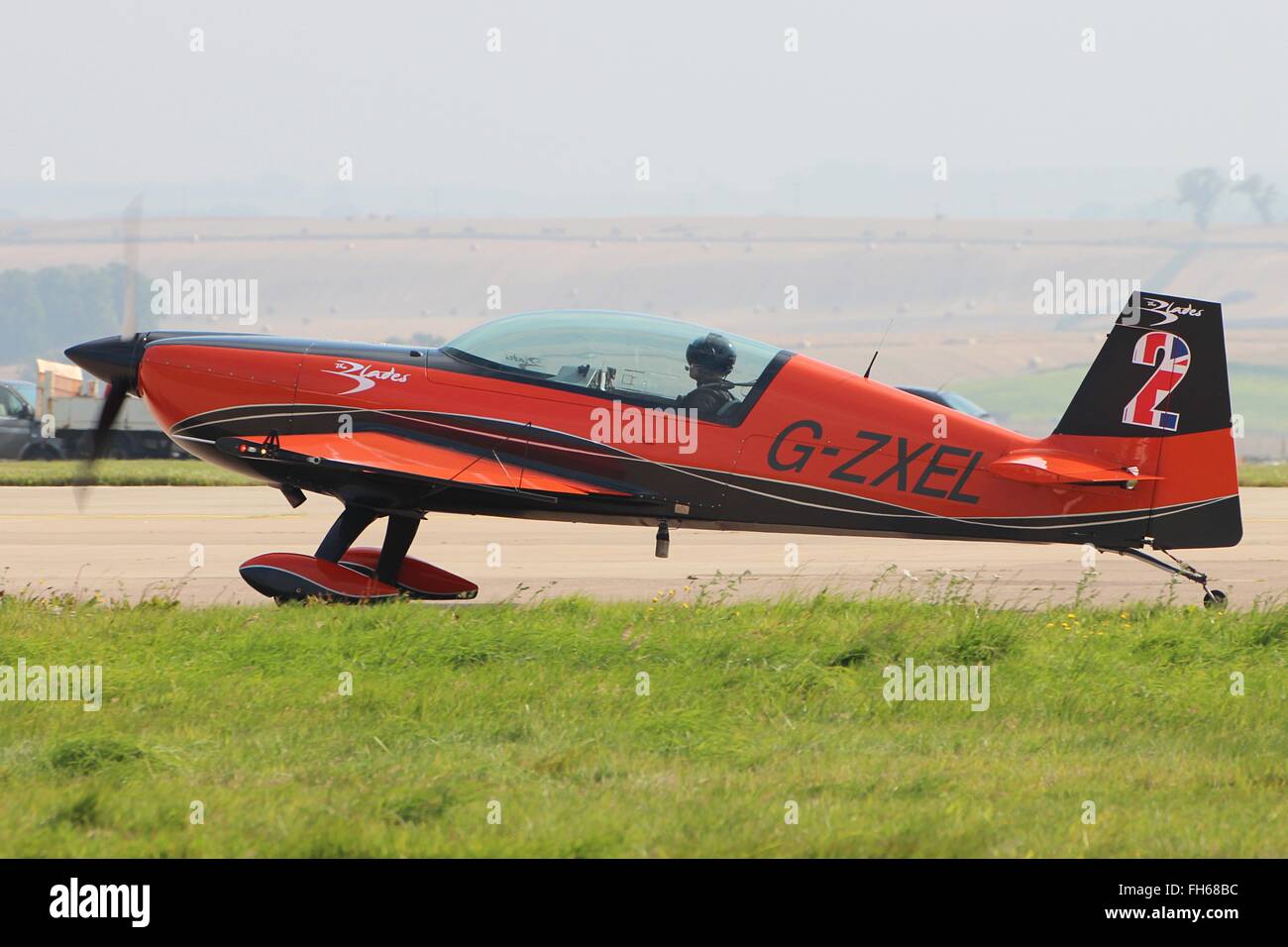 G-ZXEL, an Extra EA-300L of the Blades aerobatic display team, taxis ...