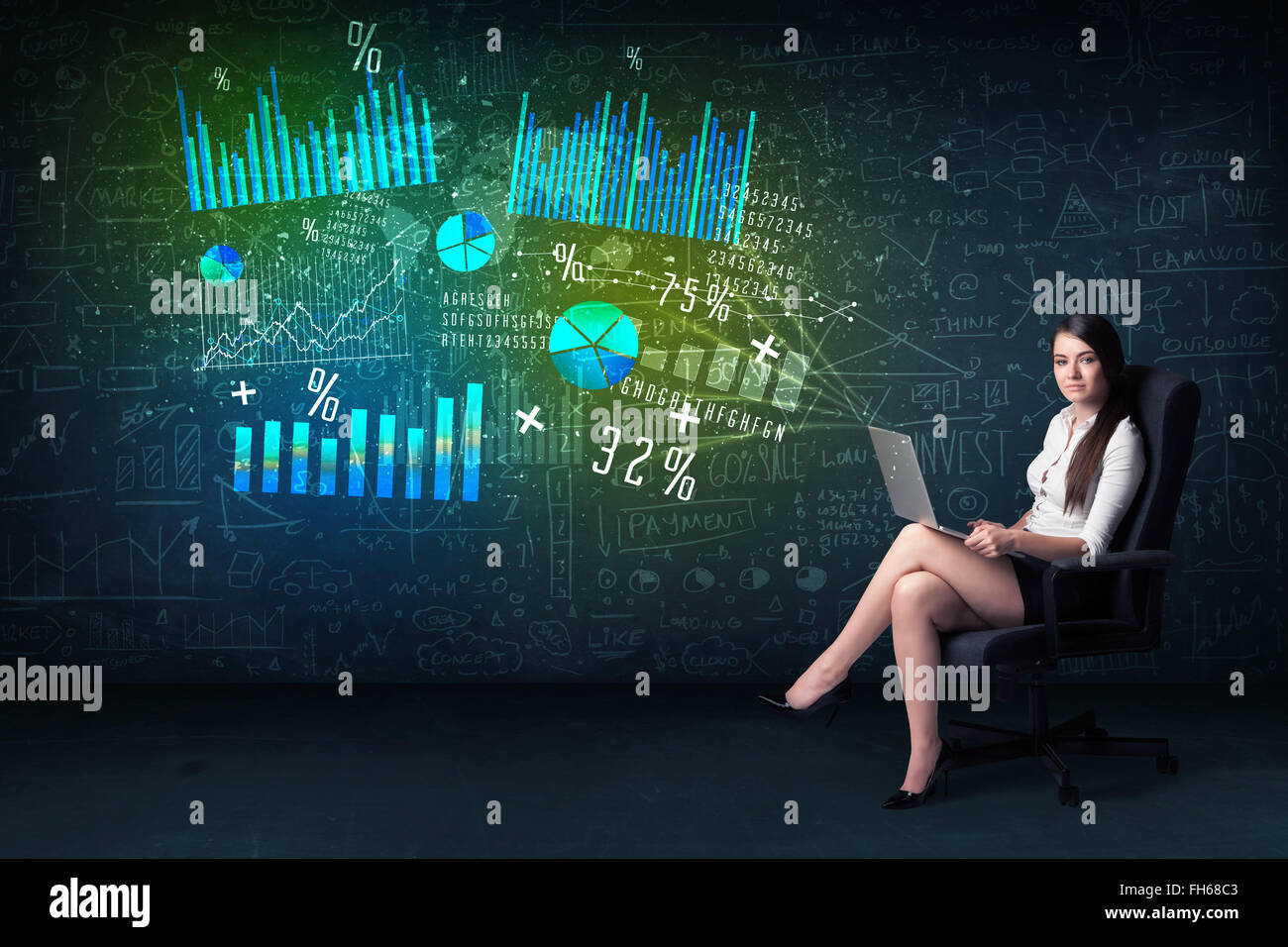 Businesswoman in office with laptop in hand and high tech graph charts ...