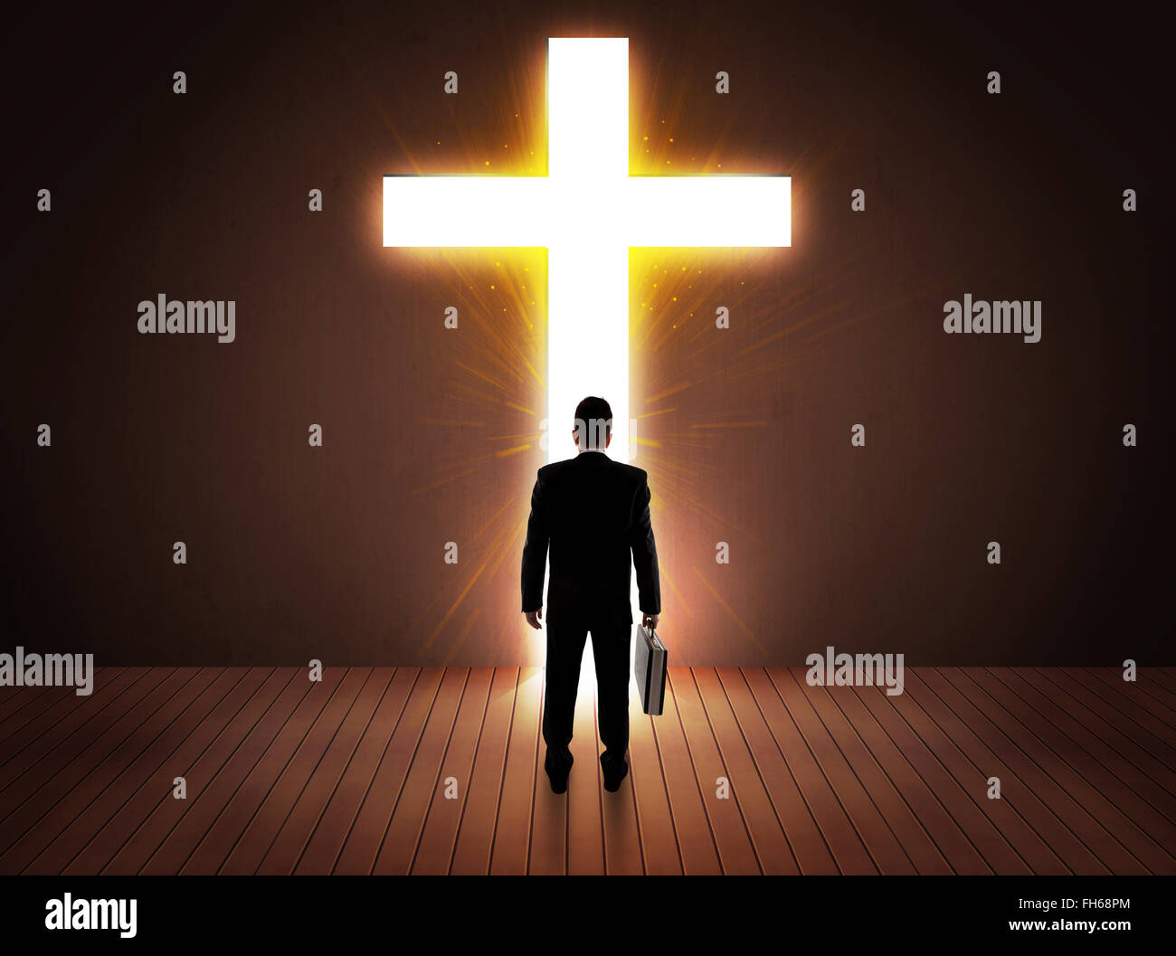 Man looking at bright cross sign Stock Photo - Alamy