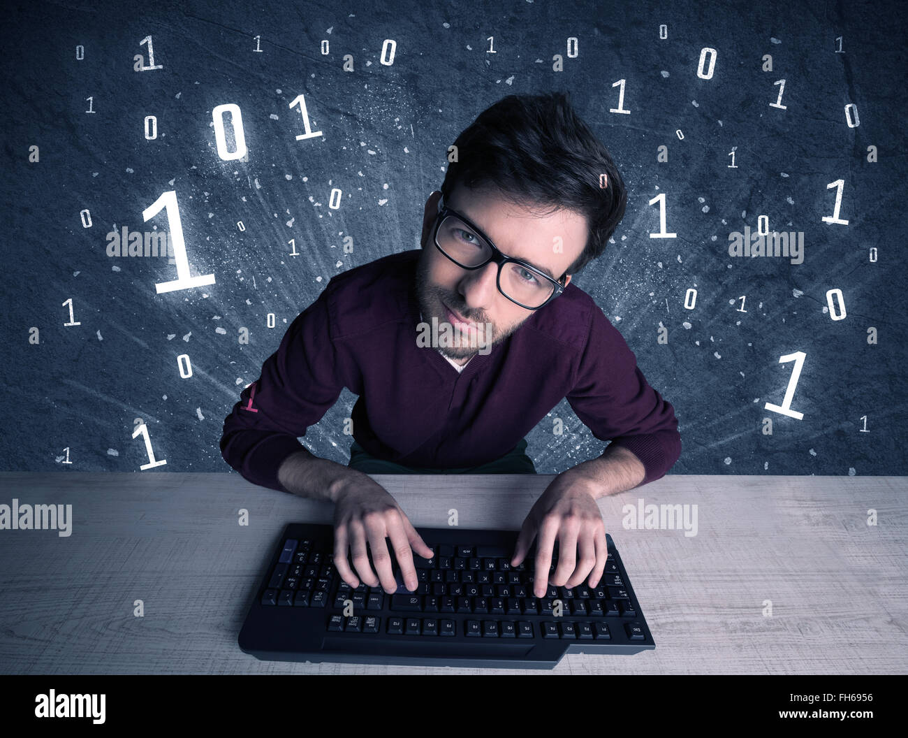Online intruder geek guy hacking codes Stock Photo - Alamy