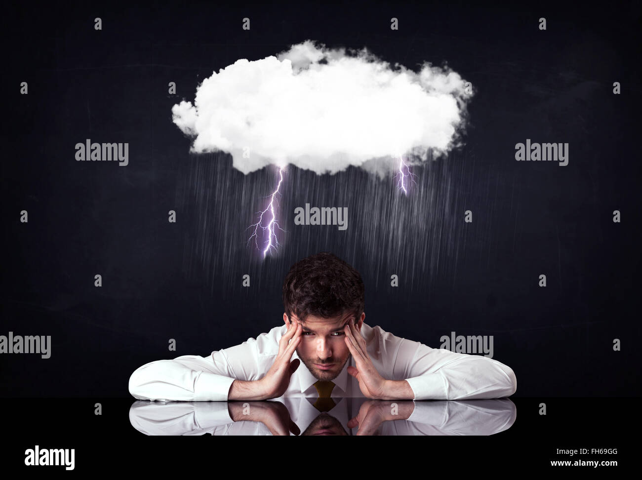 Sad man sitting under rain hi-res stock photography and images - Alamy