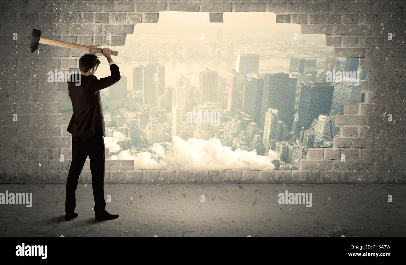 Business man hitting wall hammer hi-res stock photography and images ...