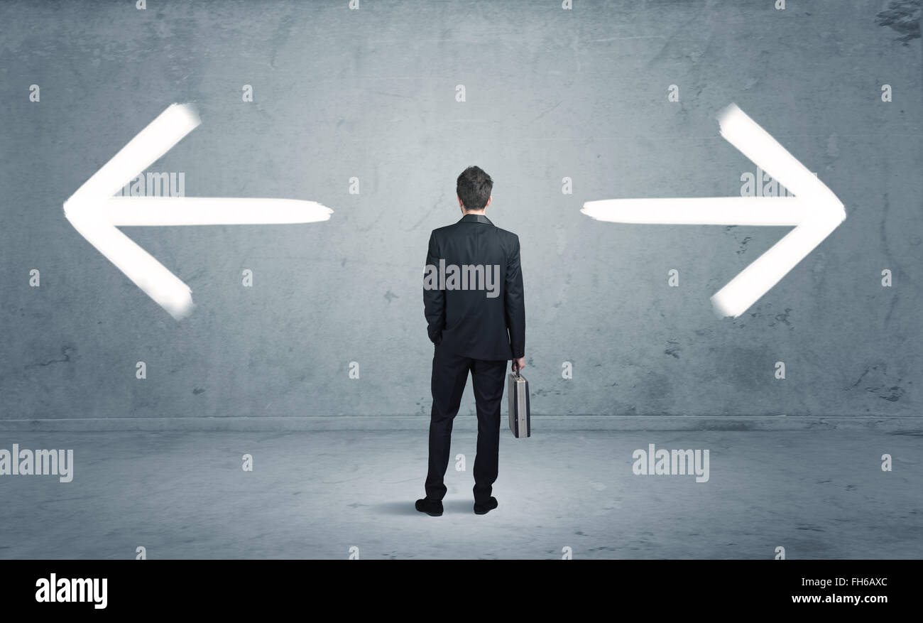 Confused business person choosing the way Stock Photo - Alamy
