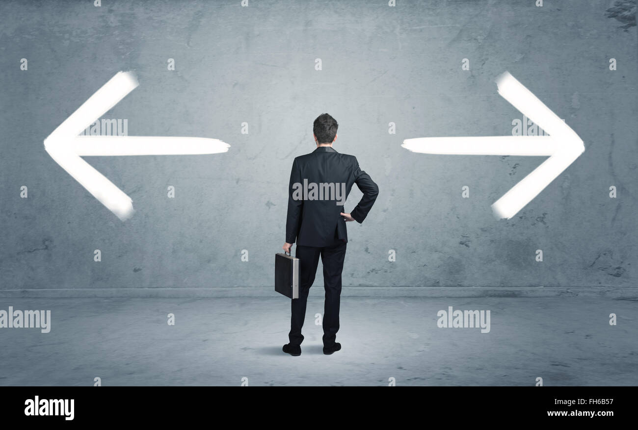 Confused business person choosing the way Stock Photo - Alamy