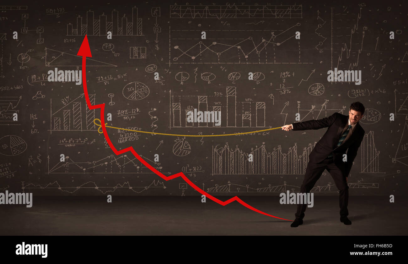 Businessman pulling a red arrow upright with a rope Stock Photo - Alamy