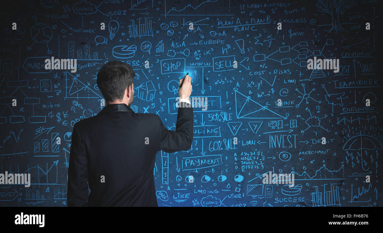 Drawing businessman with economy project background Stock Photo - Alamy