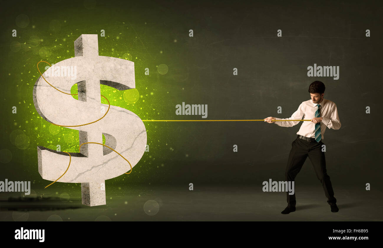 Strong man pulling car rope hi-res stock photography and images - Alamy