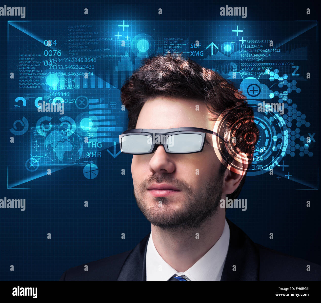 Young man looking with futuristic smart high tech glasses Stock Photo ...