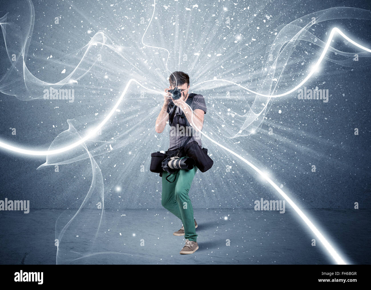 Professional photographer with dynamic lines Stock Photo - Alamy