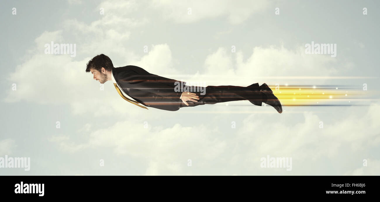 Happy business man flying fast on the sky between clouds Stock Photo ...