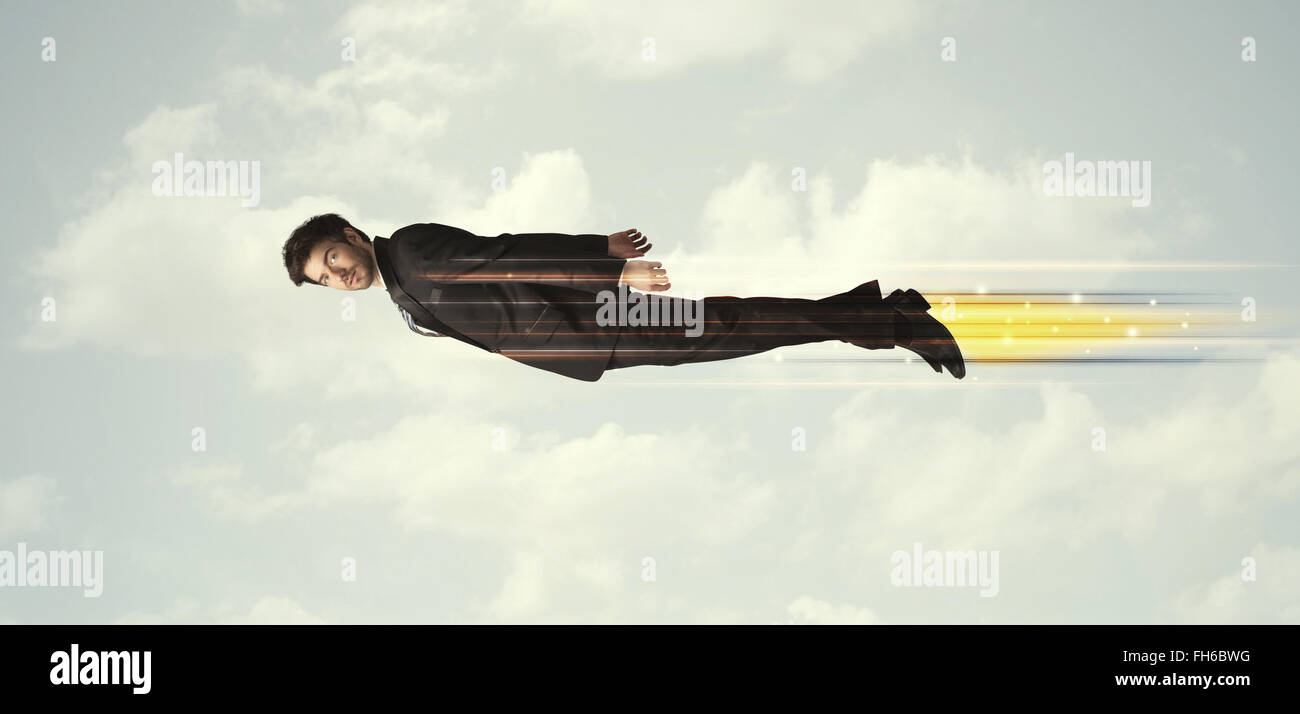 Happy business man flying fast on the sky between clouds Stock Photo ...