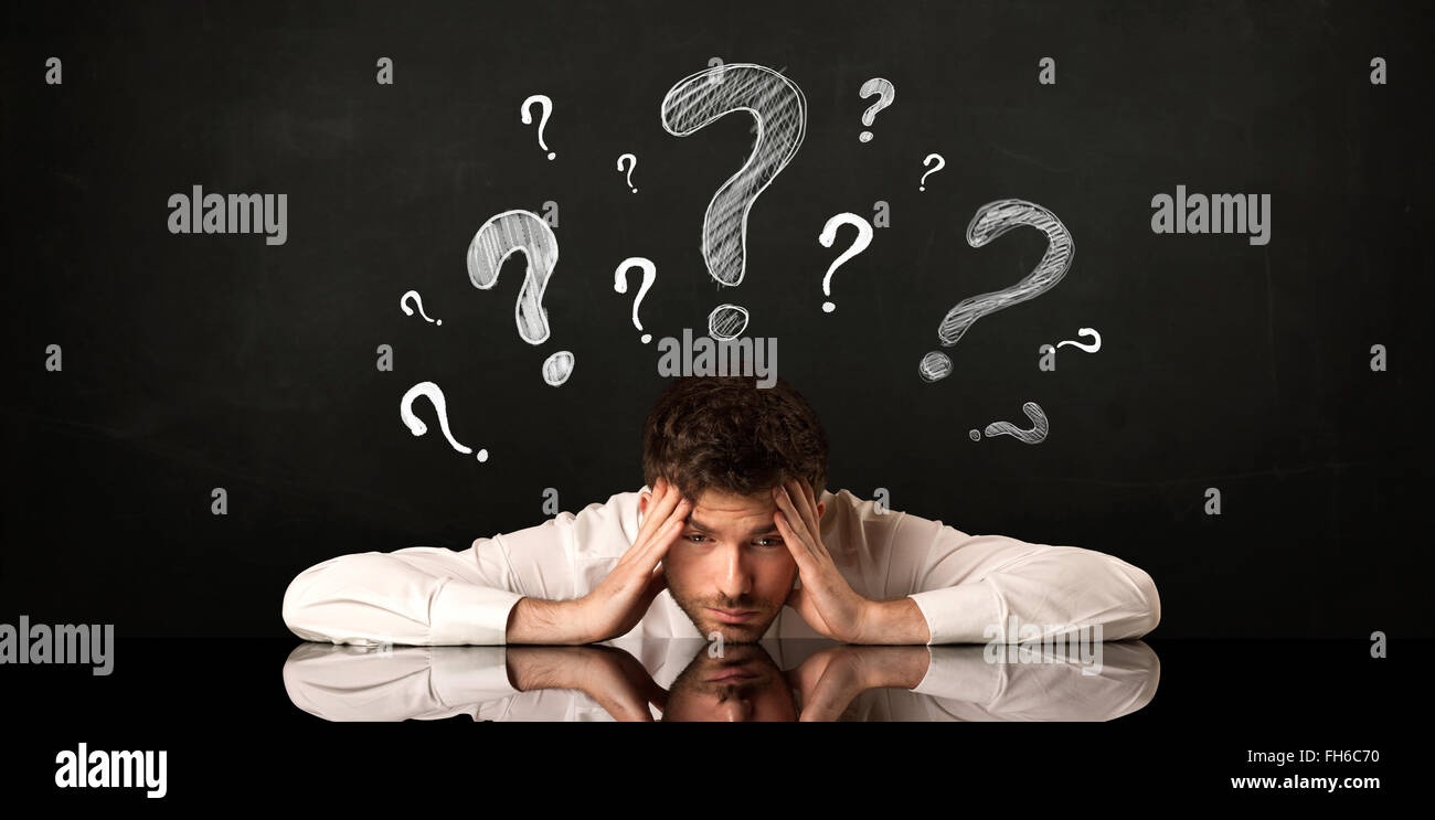 Desperate businessman question mark hi-res stock photography and images ...