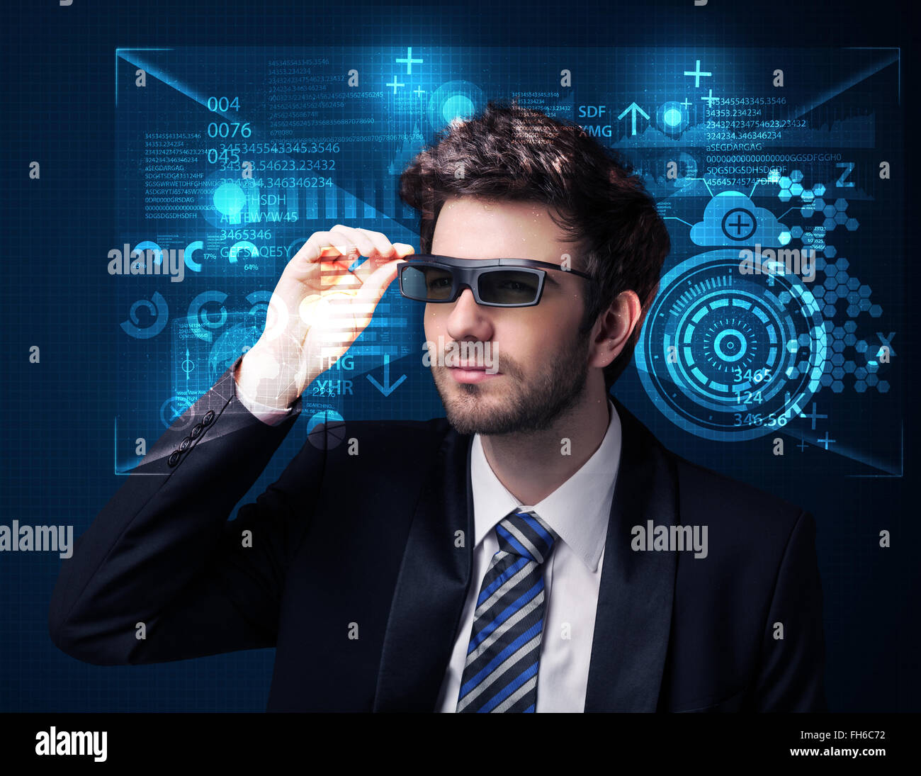 Young man looking with futuristic smart high tech glasses Stock Photo ...