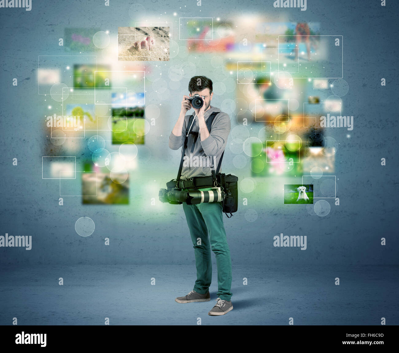 Photographer with pictures from the past Stock Photo - Alamy
