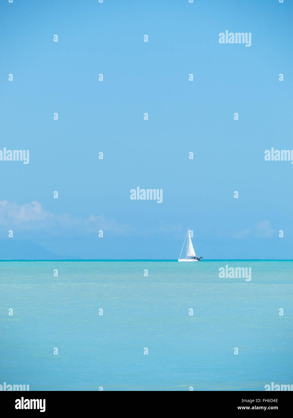 Sailboat cruising beautiful turquoise waters of the Caribbean Stock ...