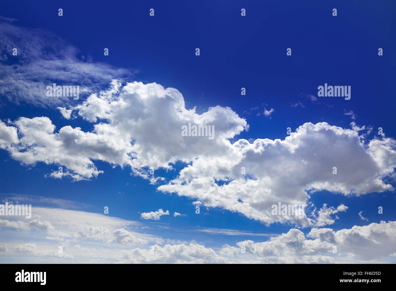 Blue sky with clouds in a summer sunny day Stock Photo - Alamy