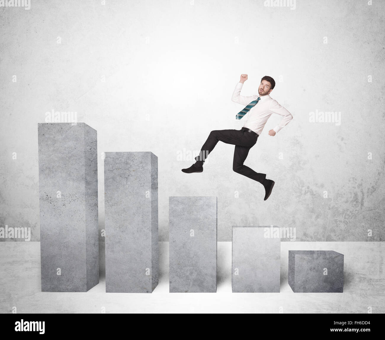 Successful business man jumping over charts on background Stock Photo ...
