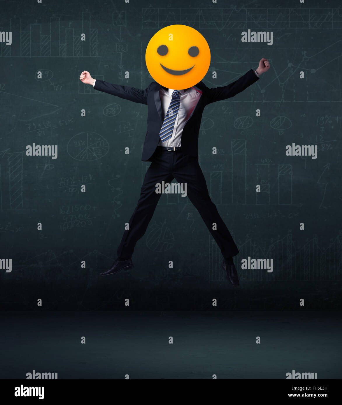 businessman wears yellow smiley face Stock Photo - Alamy