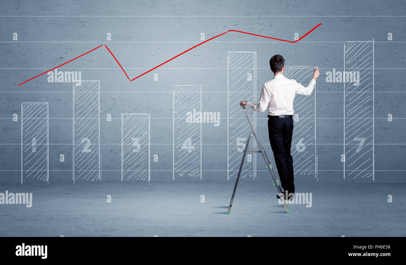Man drawing chart from ladder Stock Photo - Alamy